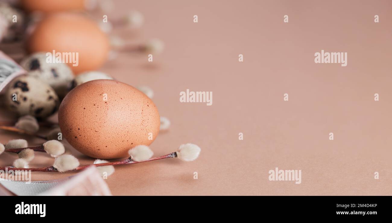 Easter background with natural color eggs and brown feathers Stock ...