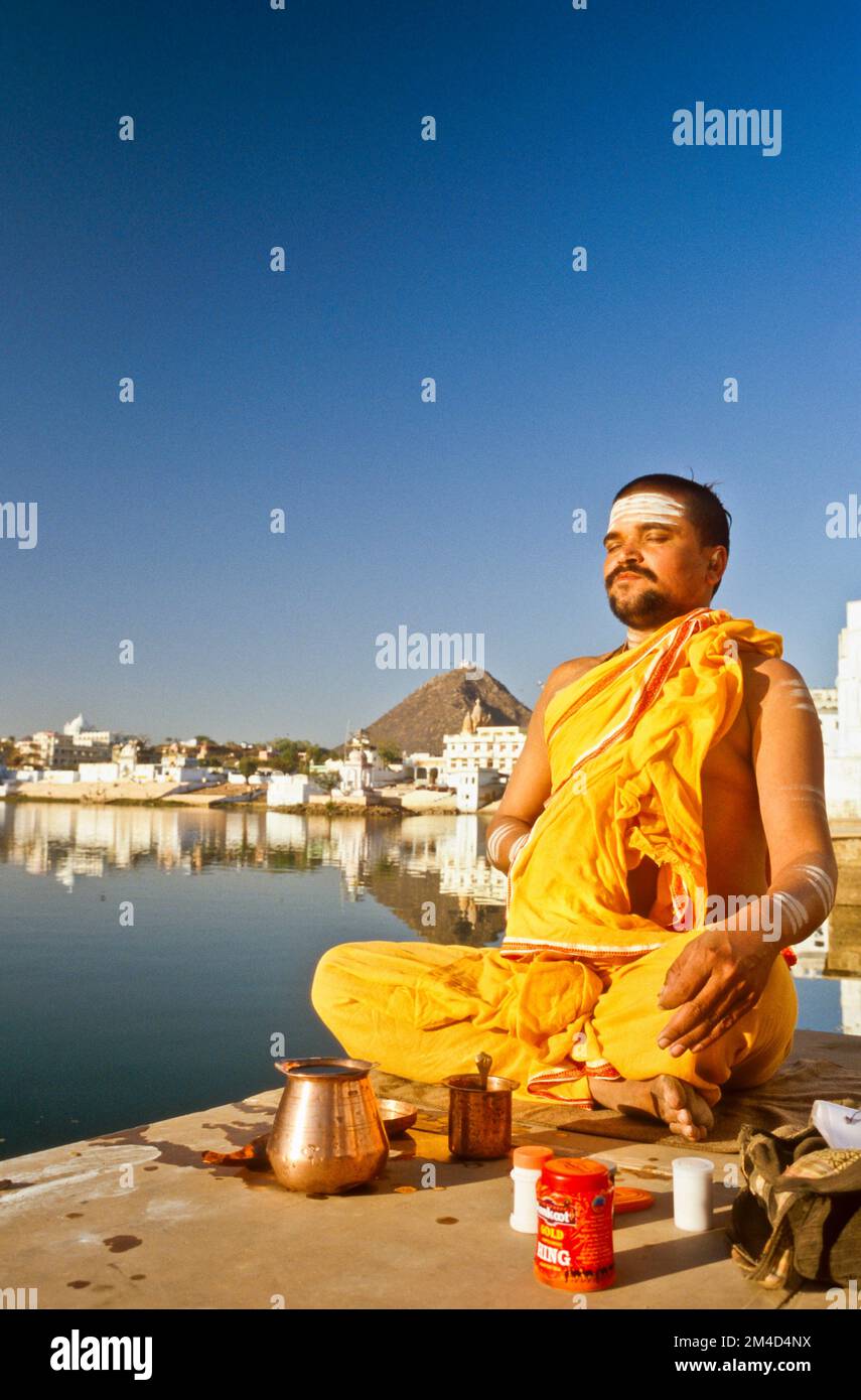 Brahmin praying to Shiva at the holy Lake of Brahma Stock Photo - Alamy