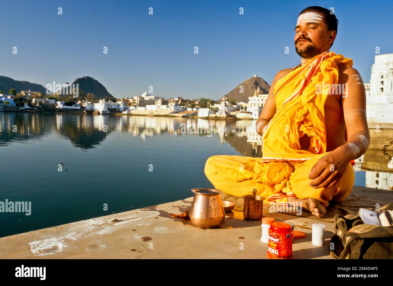 Brahmin praying to Shiva at the holy Lake of Brahma Stock Photo - Alamy