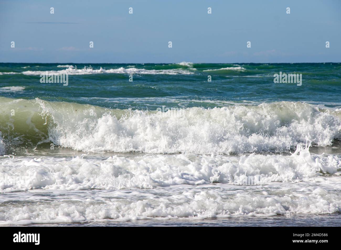 Blue Ocean, Beach, Waves Crashing and Ships in Distant in Denmark ...