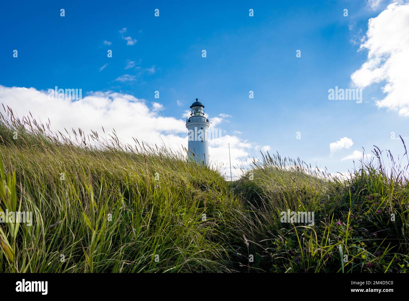 An old white lighthouse in Frederikshavn, hritshals, Denmark build ...