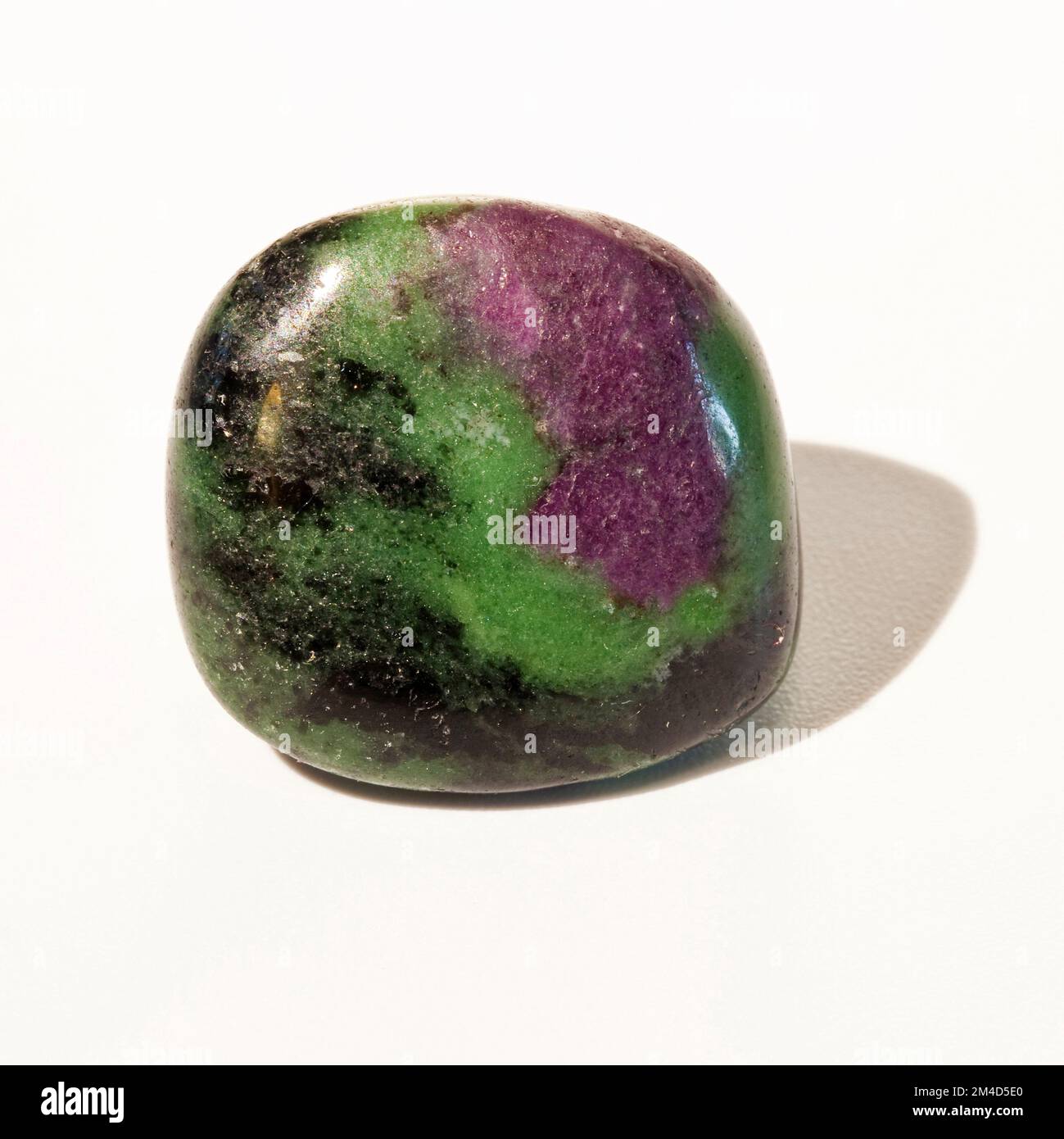 Macro close up colour photograph of 'Ruby in Zoisite' a semi precious ...