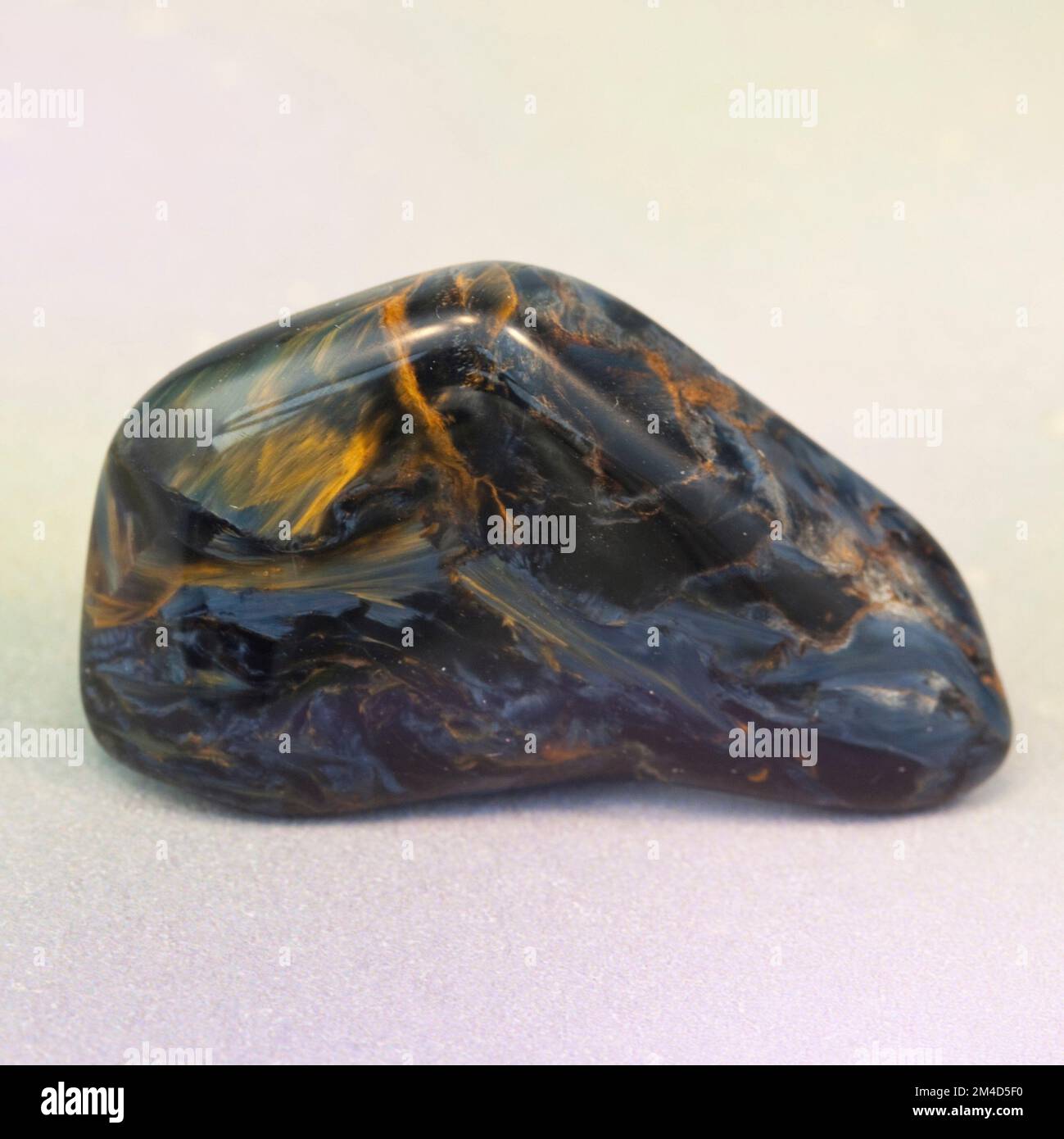 Macro close up colour photograph of 'Pietersite' a semi precious ...