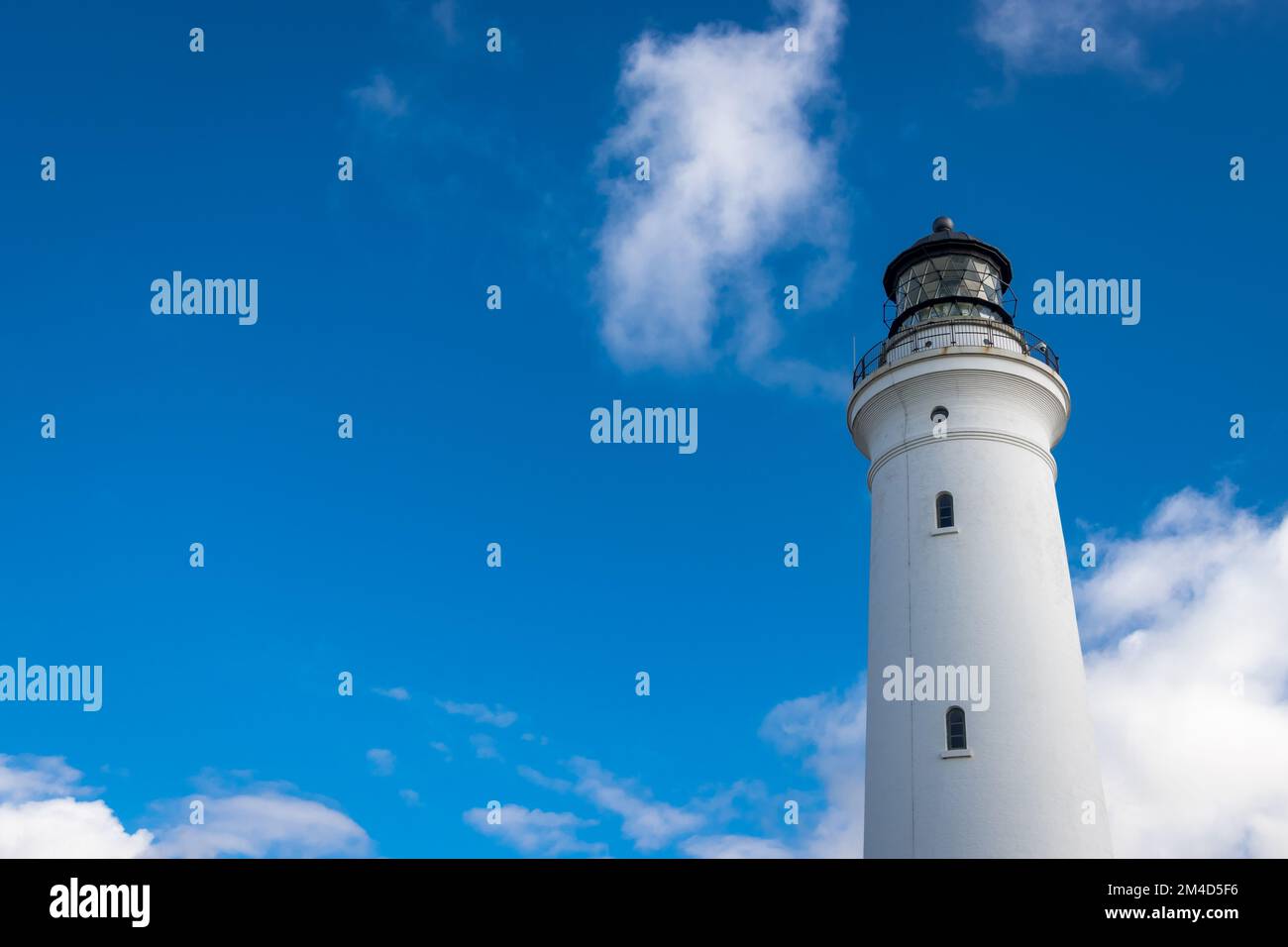 An old white lighthouse in Frederikshavn, hritshals, Denmark build ...