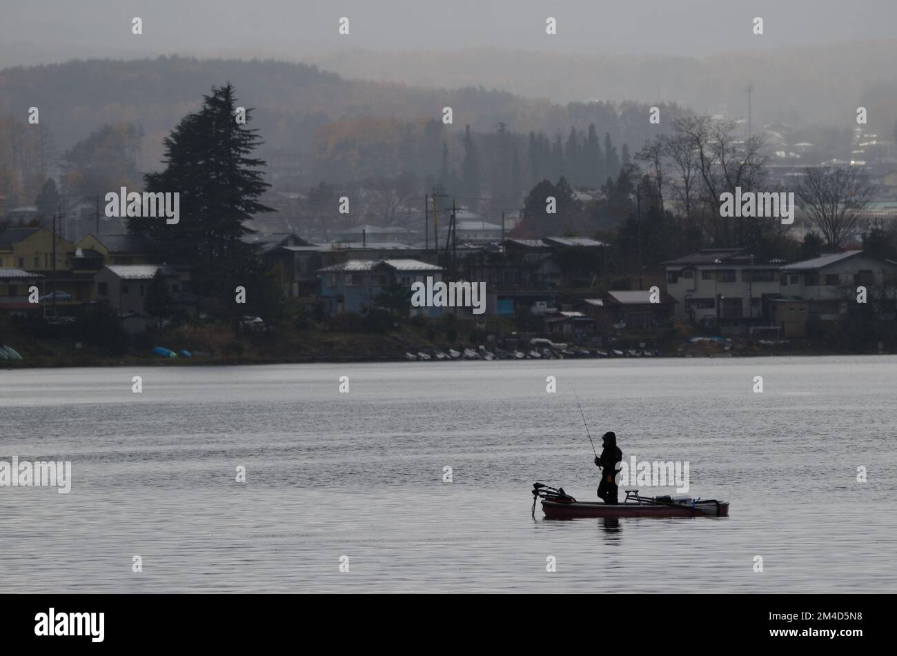 Man fishing in a boat. Lake Kawaguchi. Yamanashi Prefecture. Fuji ...