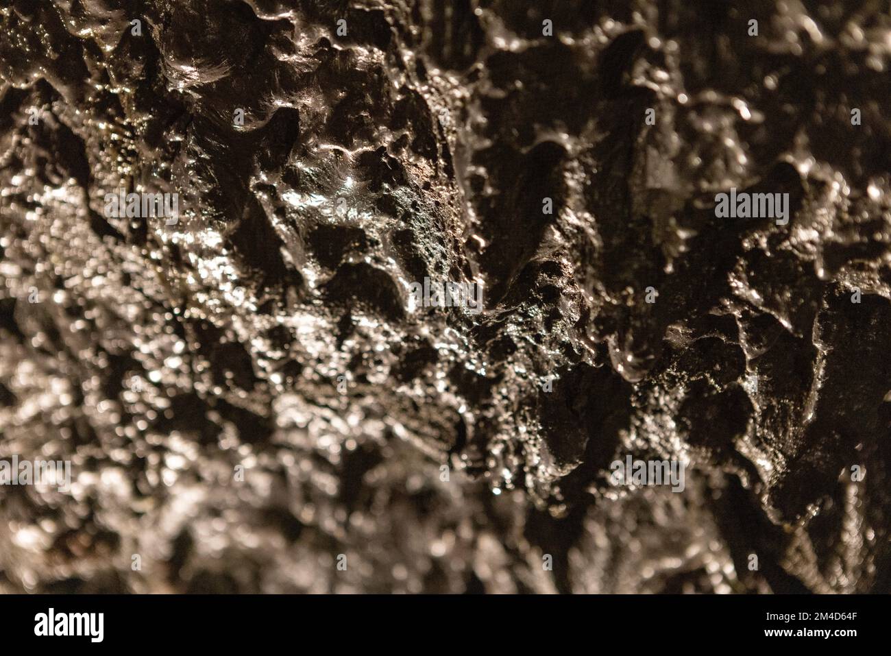 Exploring a volcanic cave in the Volcanic Caves Park at the foot of ...