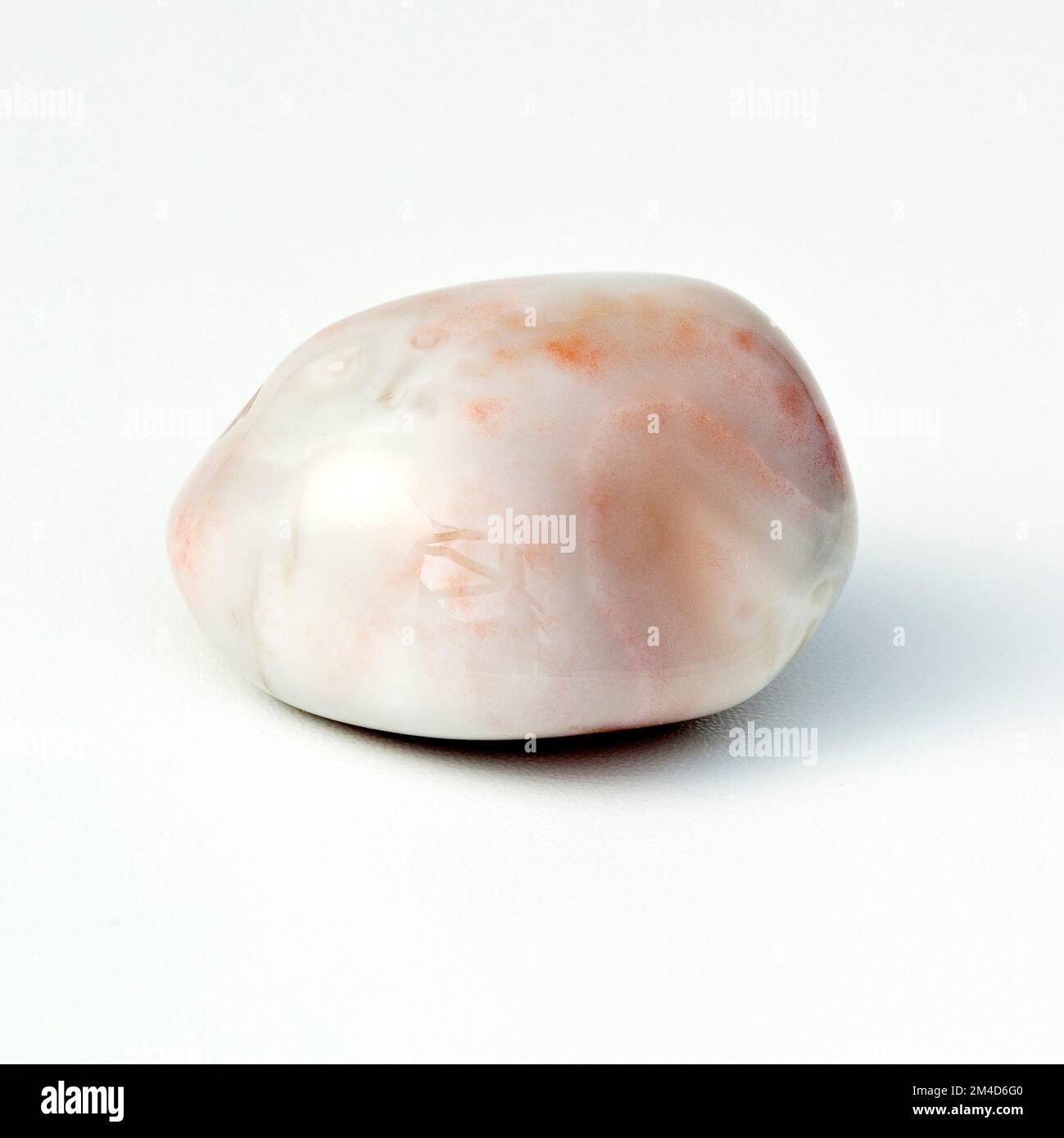 Macro close up colour photograph of ''Pink Botswana Agate' ' a semi ...