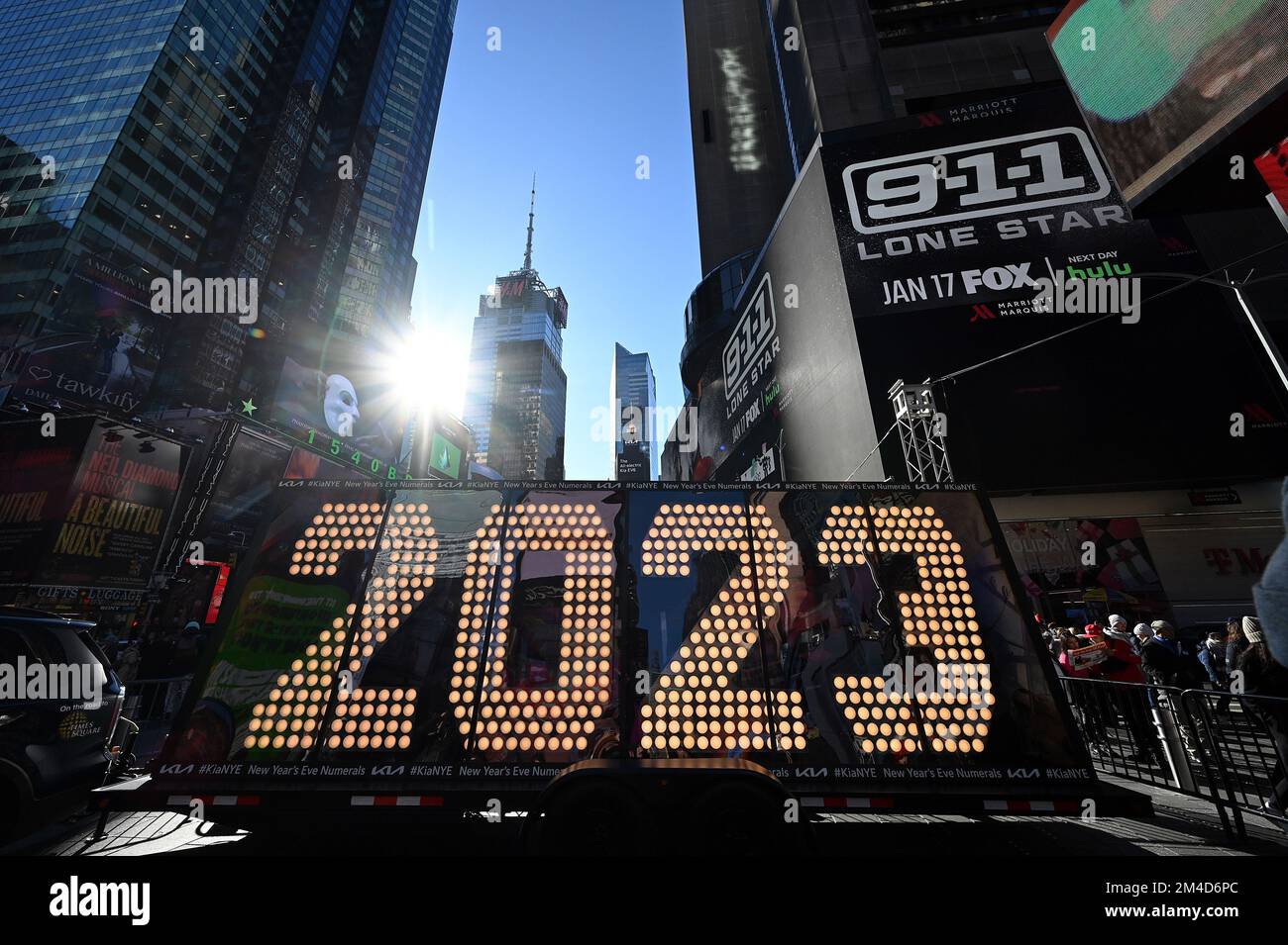 The 2023 New Year's Eve numerals are illuminated after being delivered ...
