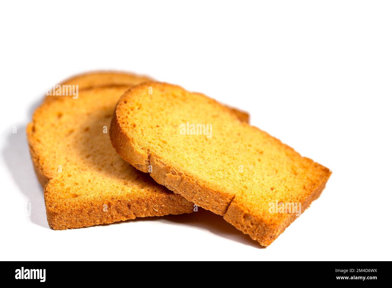 Rusk slices isolated against white background Stock Photo - Alamy
