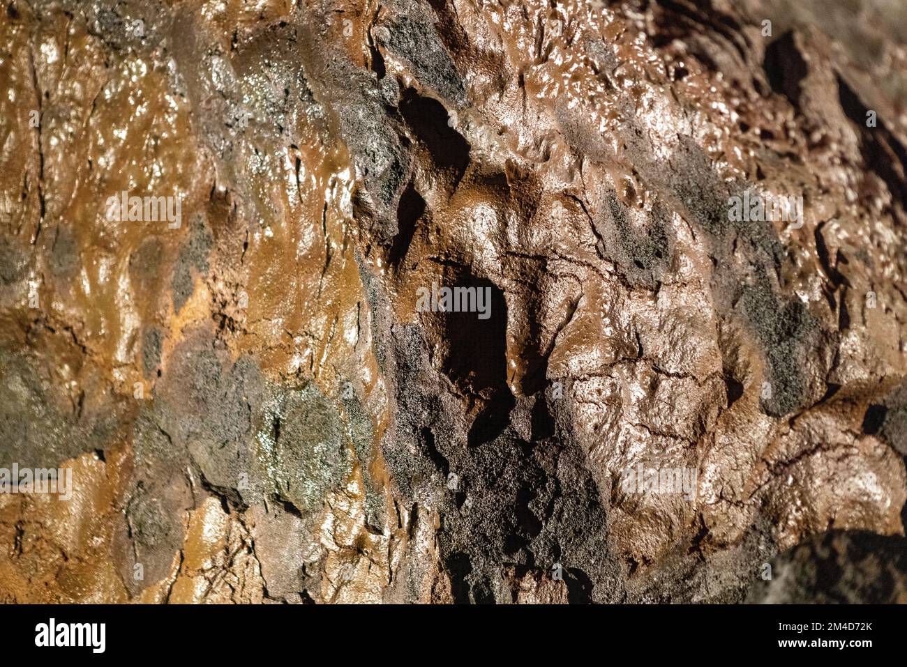 Exploring a volcanic cave in the Volcanic Caves Park at the foot of ...