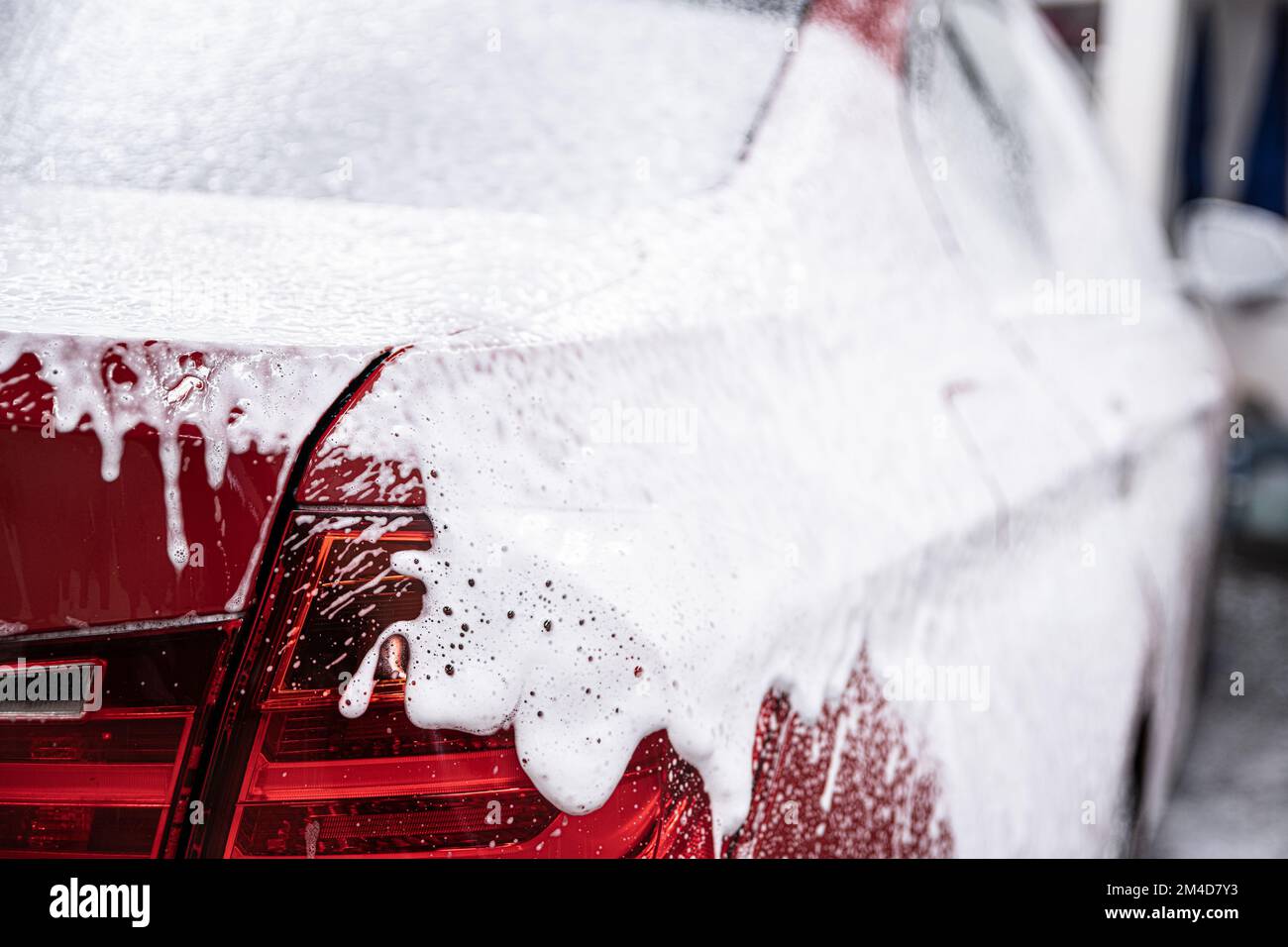 Red car covered soap hi-res stock photography and images - Alamy