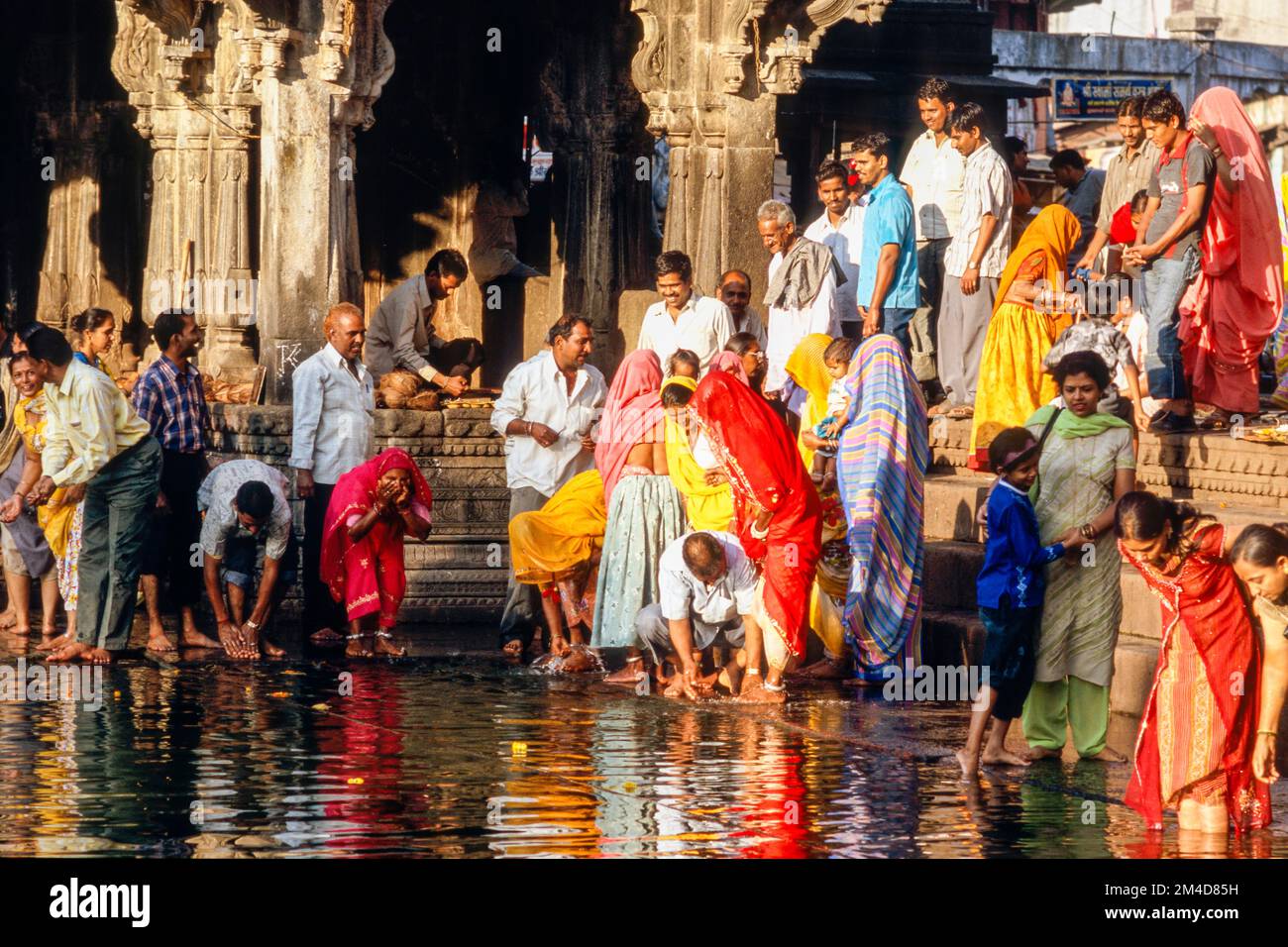 Pilgrims bath in the source of the holy river Godavari to wash away ...