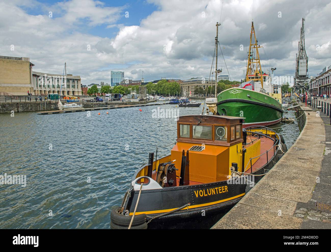 Bristol Floating Harbour with moored boats and cranes near the MSheds ...