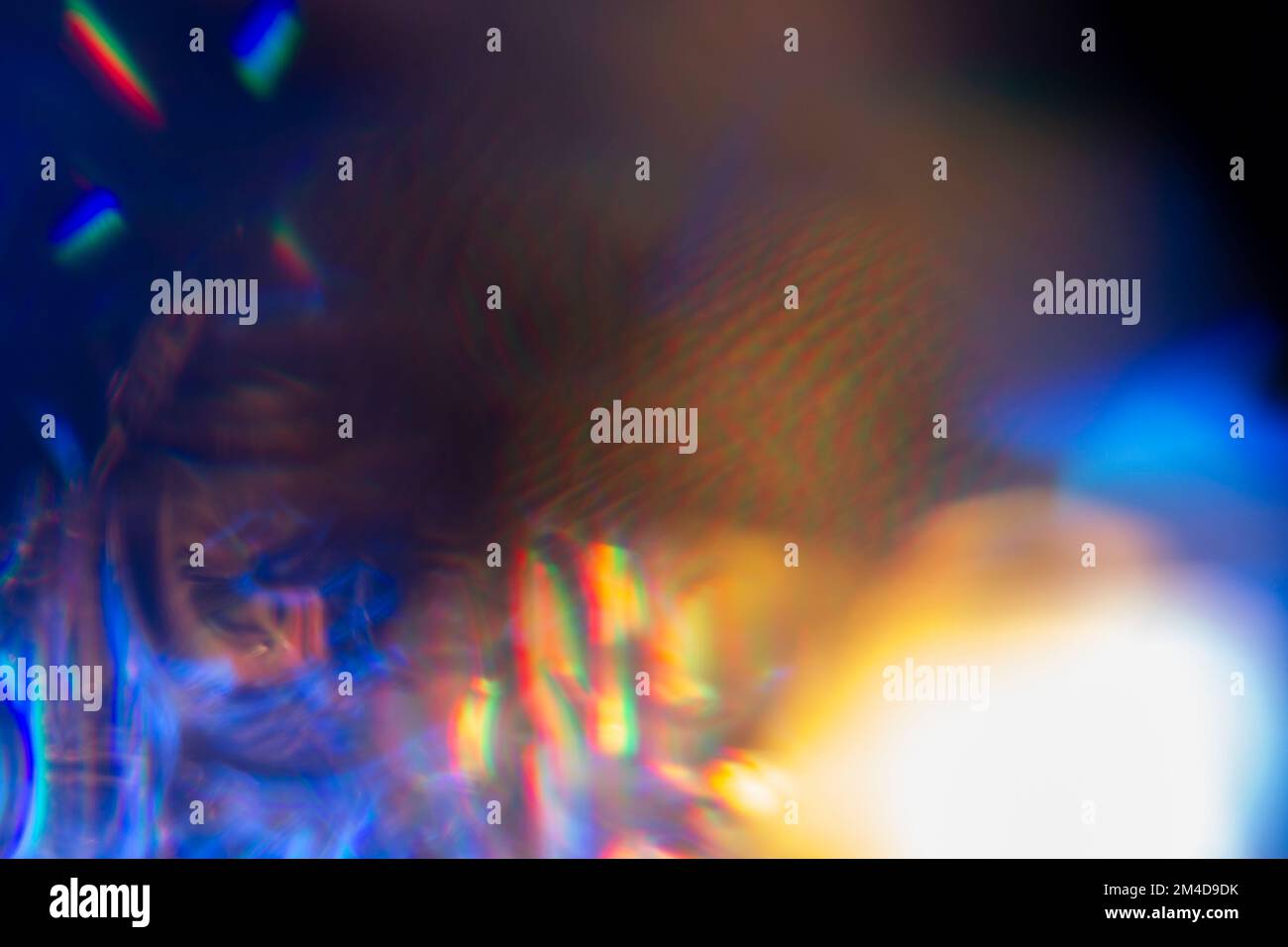 Colorful light leak on black background, abstract design with optical ...