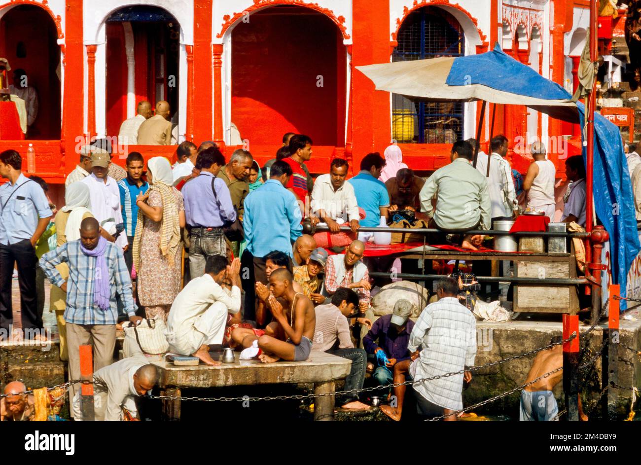 Priests offering ceremonies and blessings to thousends of pilgrims ...