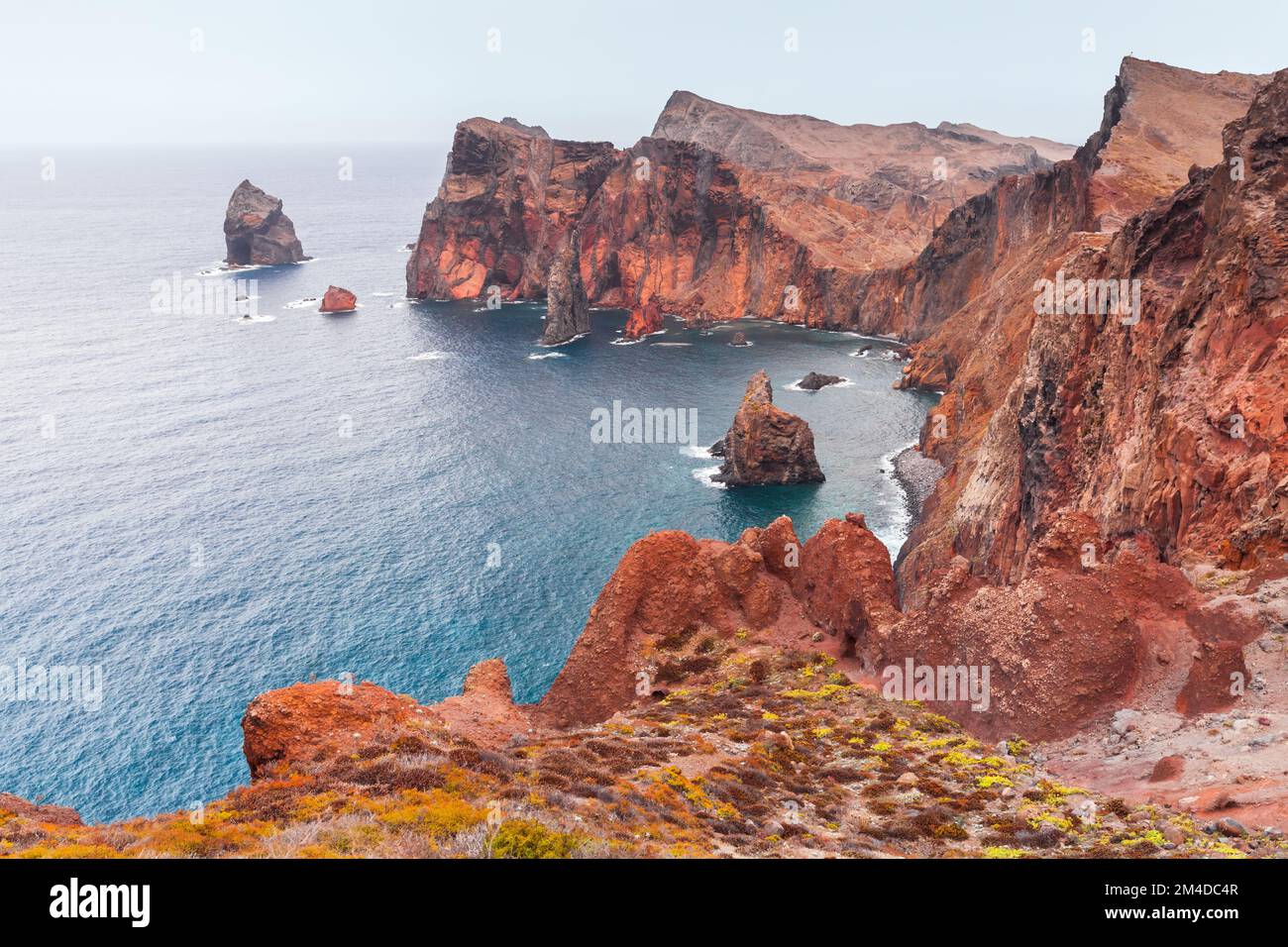 Coastal landscape with red rocks and islets of Ponta de Sao Lourenco ...