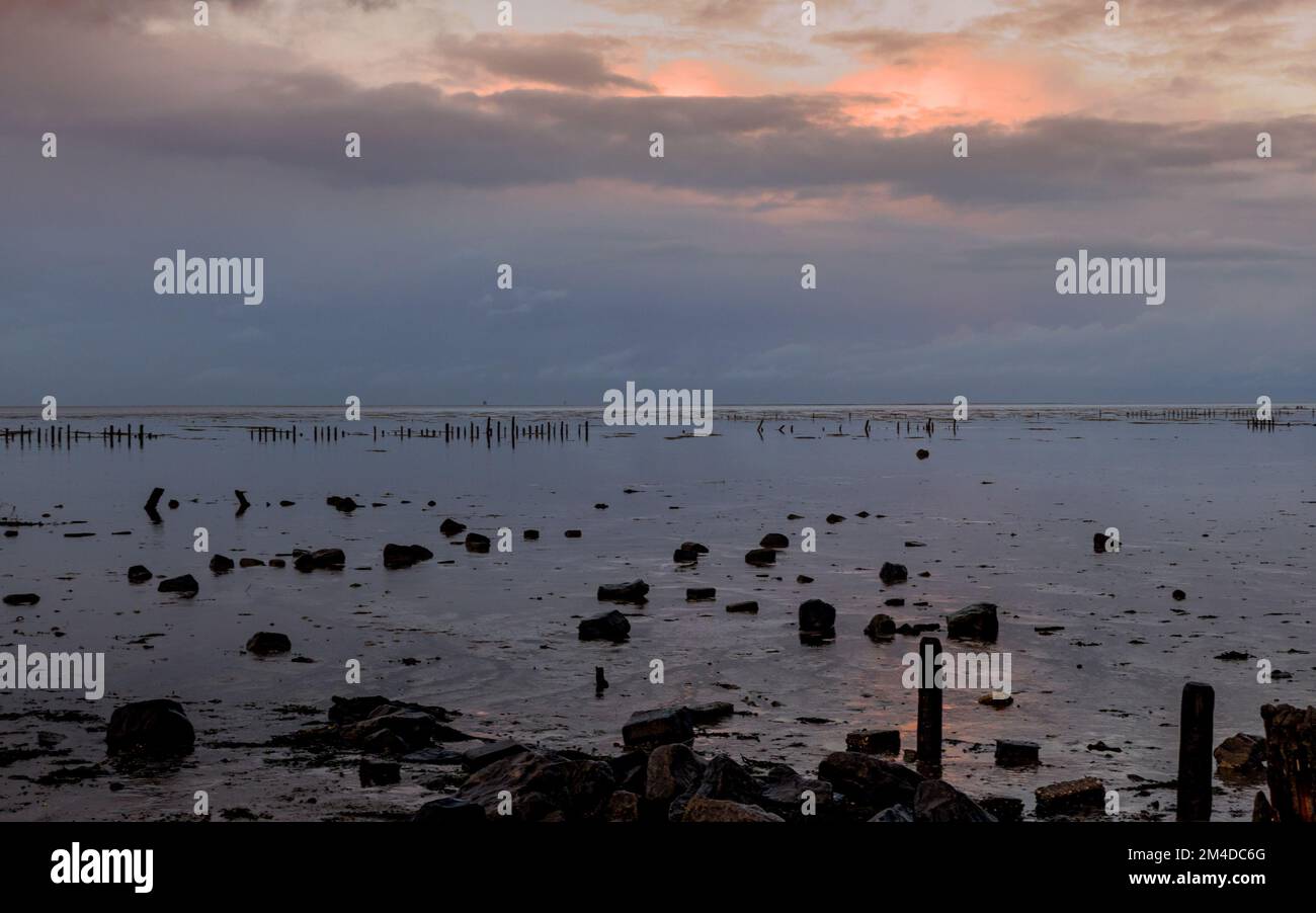 Rocks and sea breakers off the Frisian coast, Netherlands Stock Photo ...