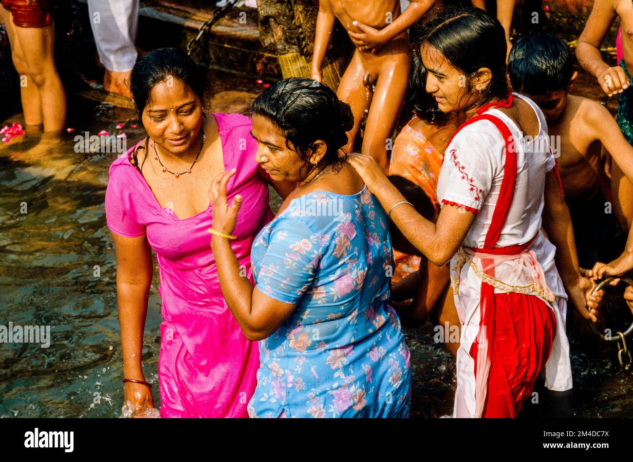 A group of women taking bath at Har-Ki-Pauri-Ghat, the famous bathing ...