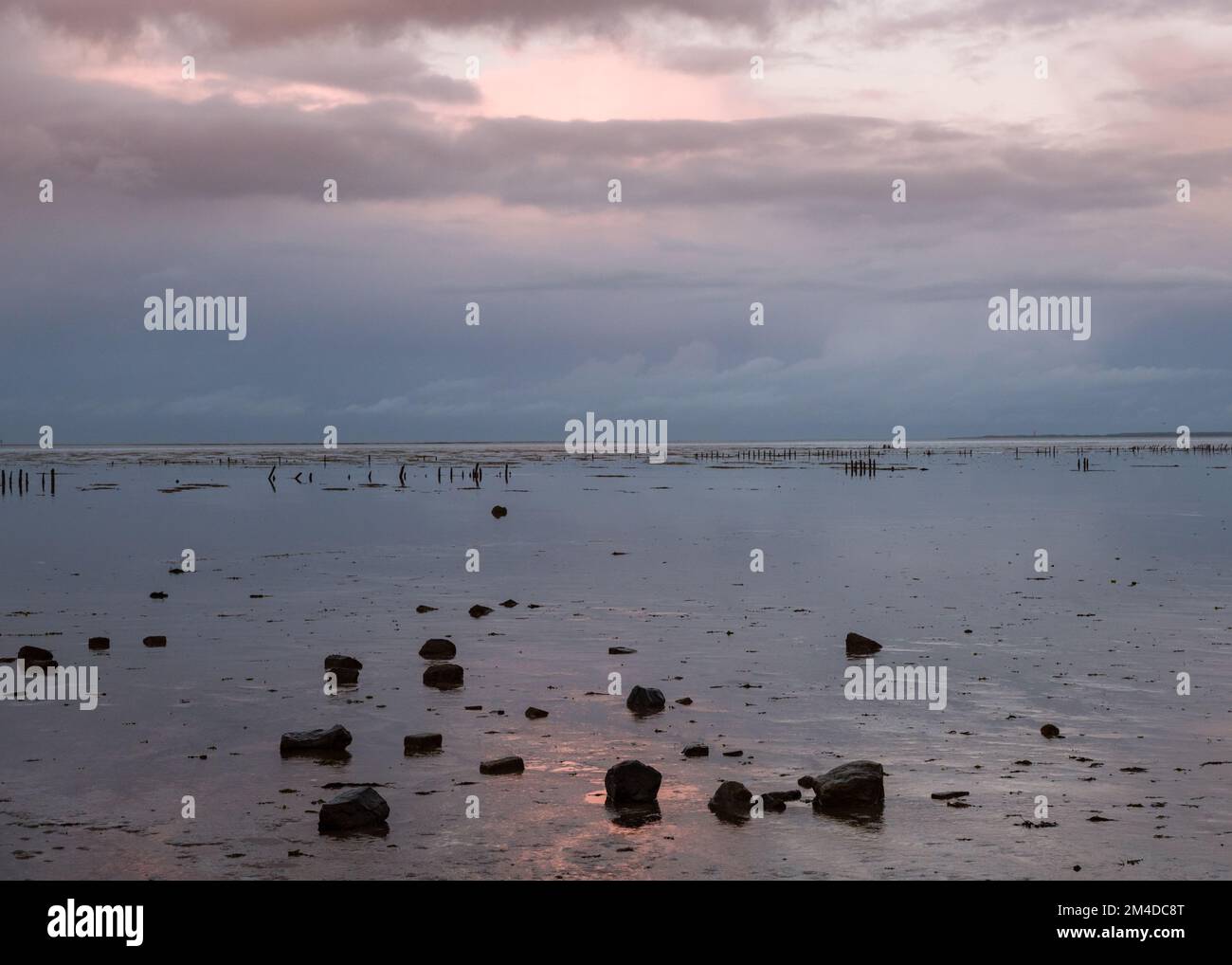 Rocks and sea breakers off the Frisian coast, Netherlands Stock Photo ...