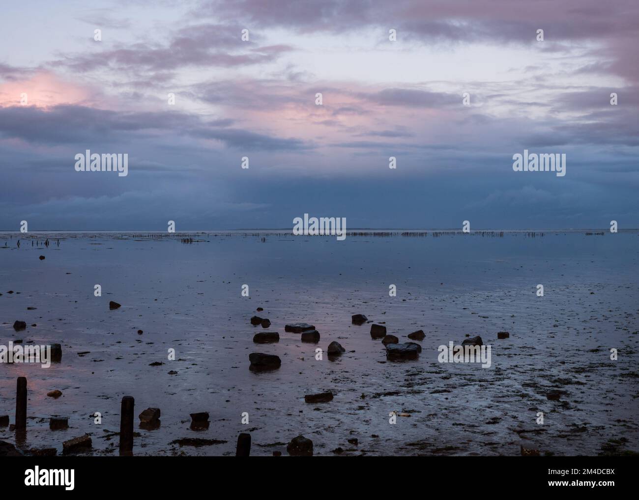 Rocks and sea breakers off the Frisian coast, Netherlands Stock Photo ...