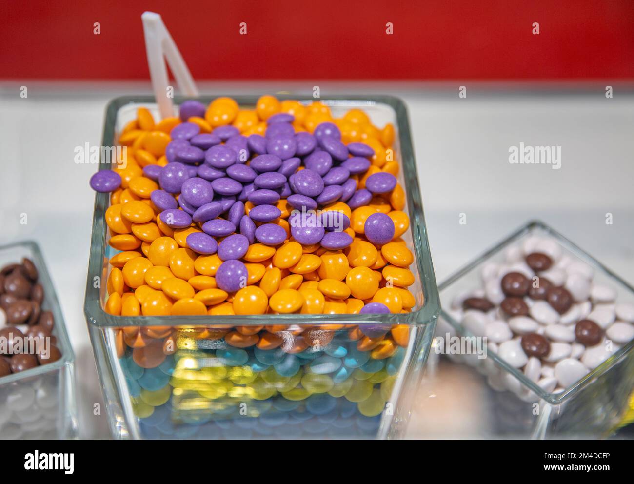 colorful sweet chocolate buttons dragees of various types closeup Stock ...