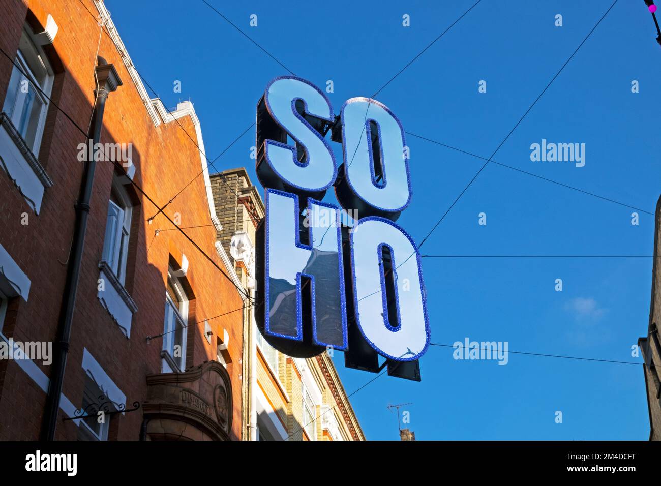 Giant Soho sign blue letters against blue sky copyspace copy space near ...