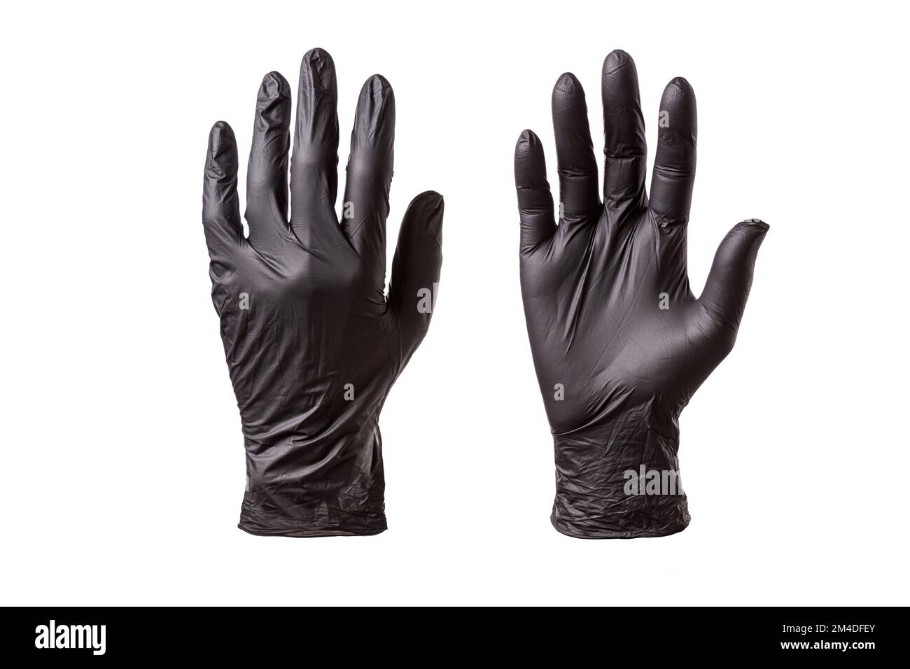 Black gloves worn on the hands, the outer and inner sides of the hands ...