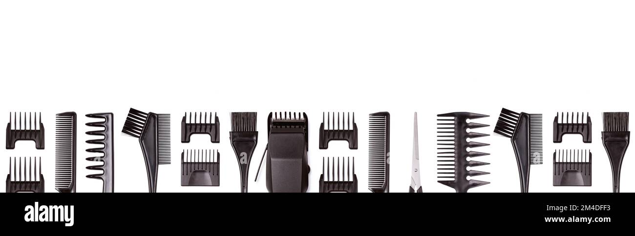 Professional hair clipper with set of nozzles of different sizes ...