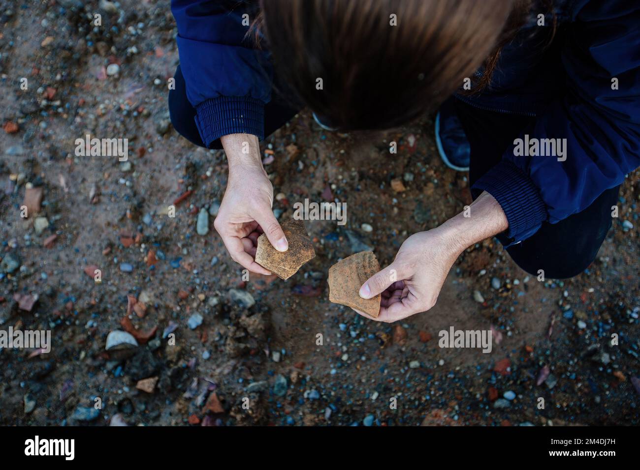 Artifact in ground archaeologist hi-res stock photography and images ...