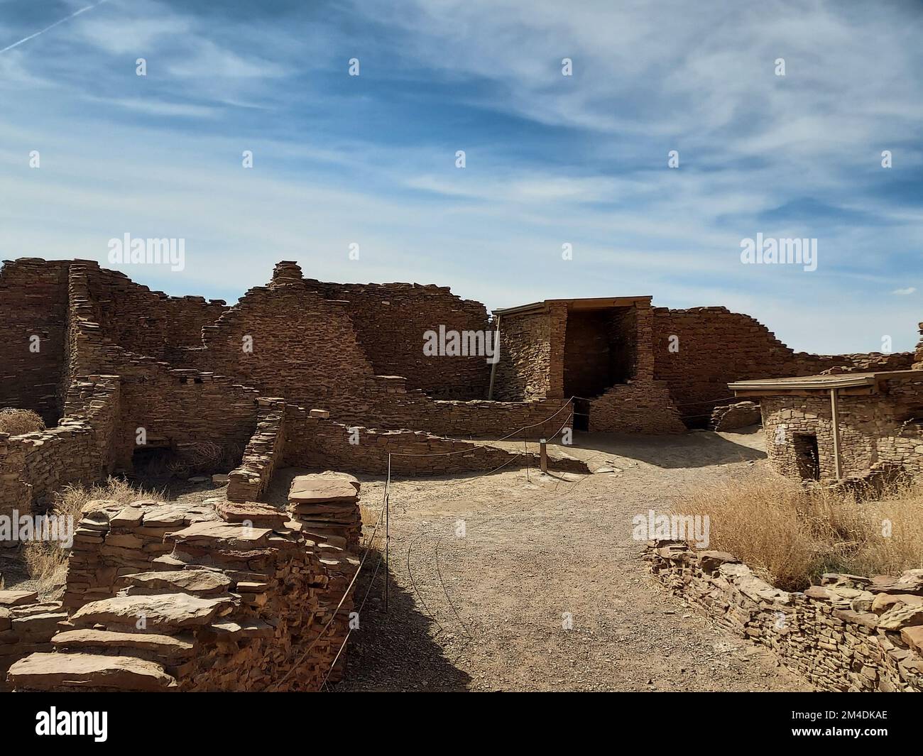 The ruins of the ancient Chaco Canyon with blue cloudy sky in Chaco ...