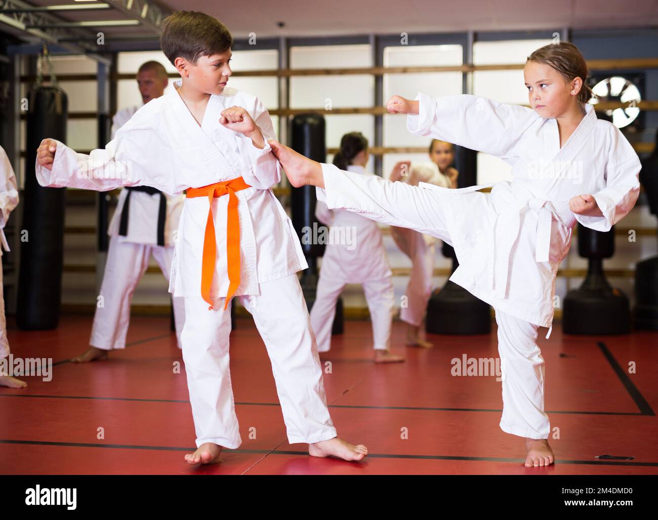 Children exercise pairs hi-res stock photography and images - Alamy