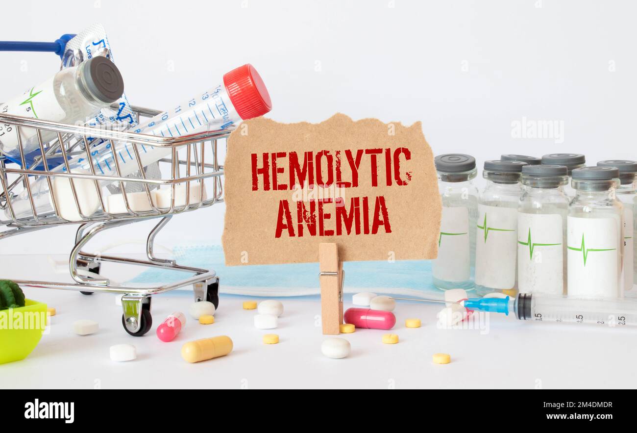 Medical concept. On a blue background, pills, capsules and puzzles with ...