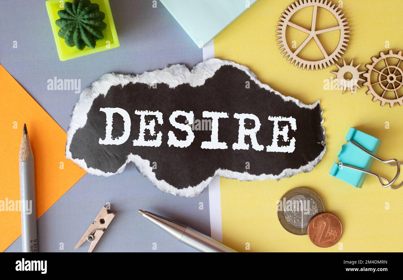 Desire symbol. Concept word Desire on wooden cubes. Beautiful yellow ...