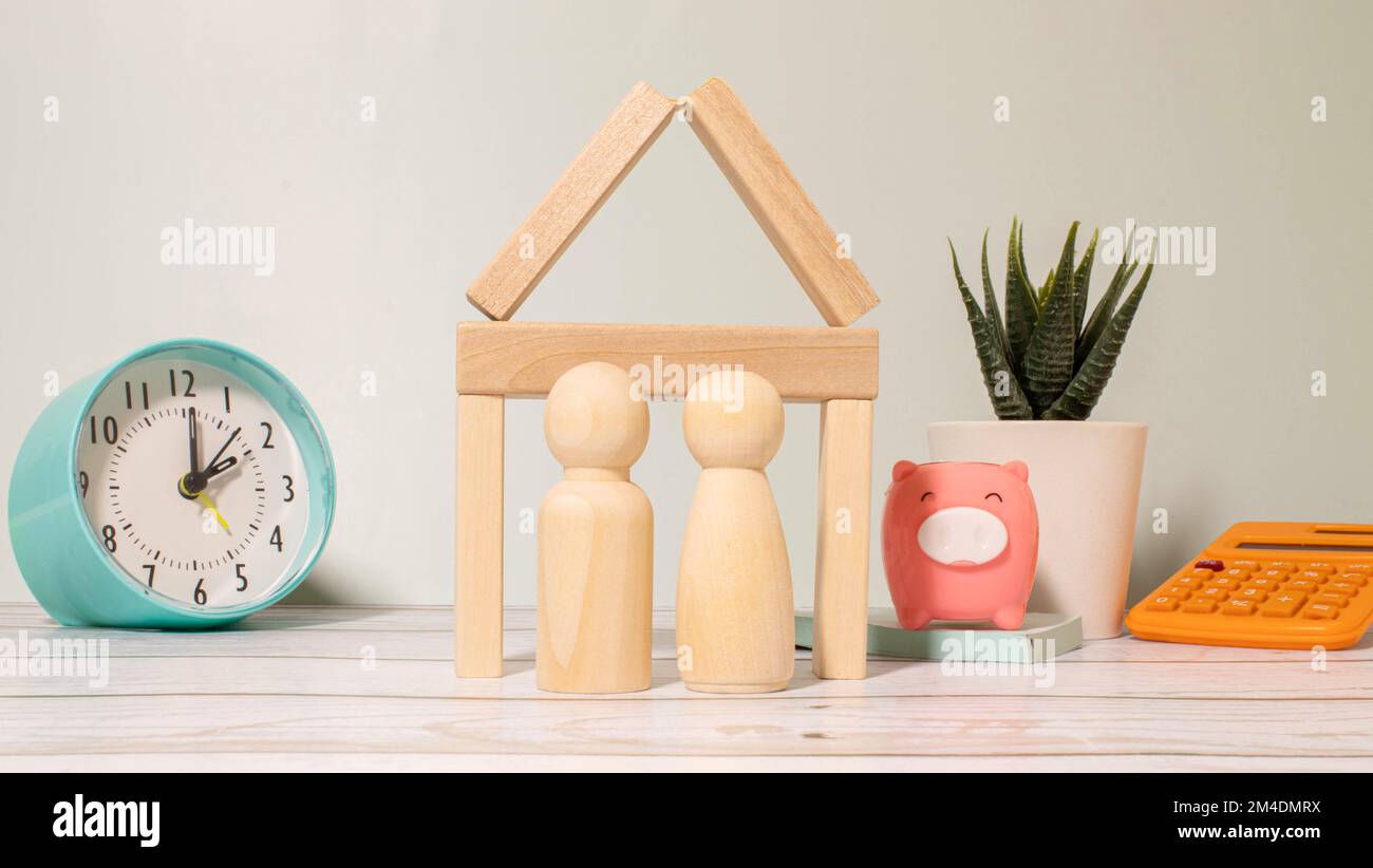 The young man used both of his hands to protect from the falling wooden ...