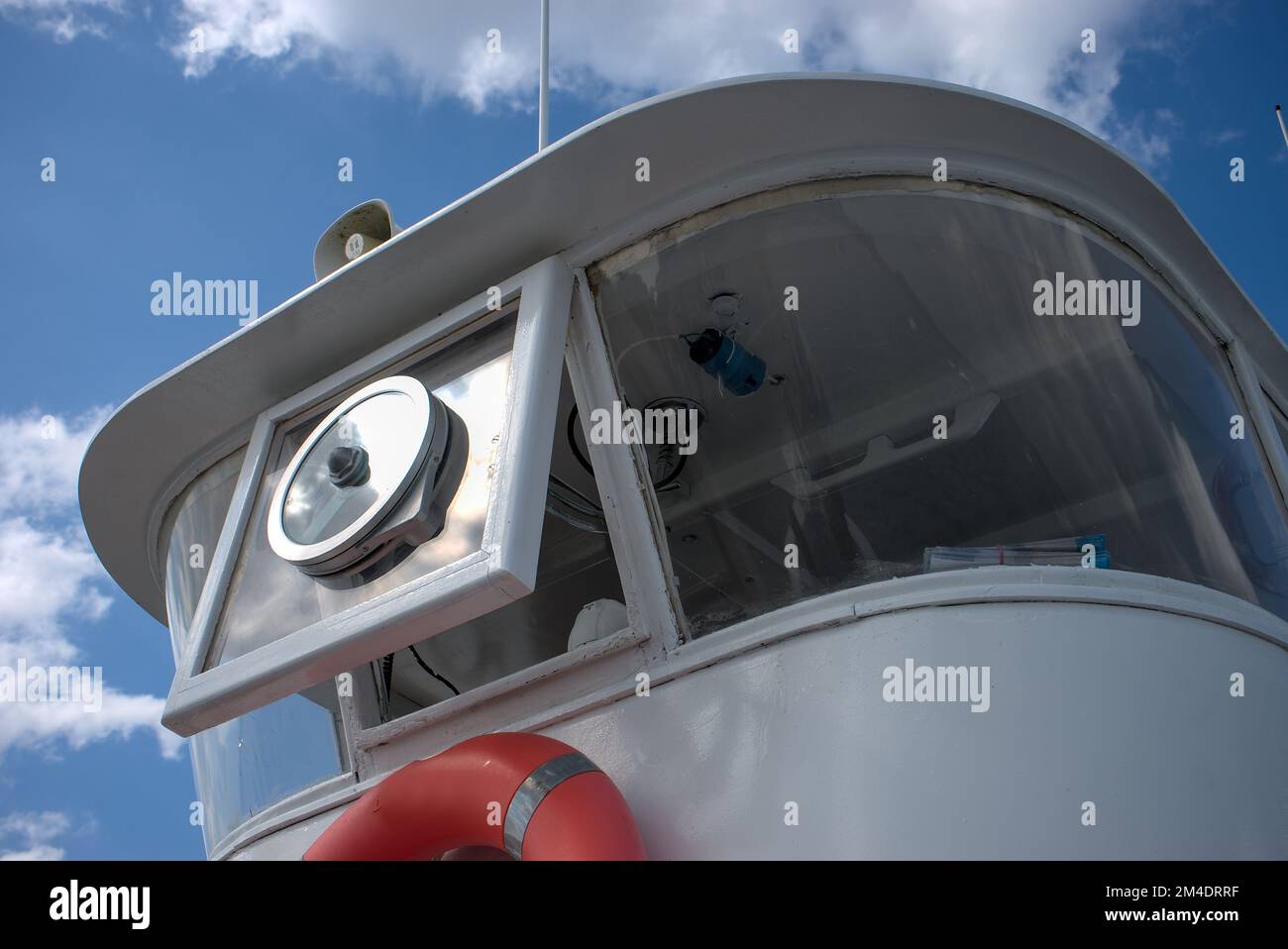 Low angle fishing boat cabin, view of the sk Stock Photo - Alamy