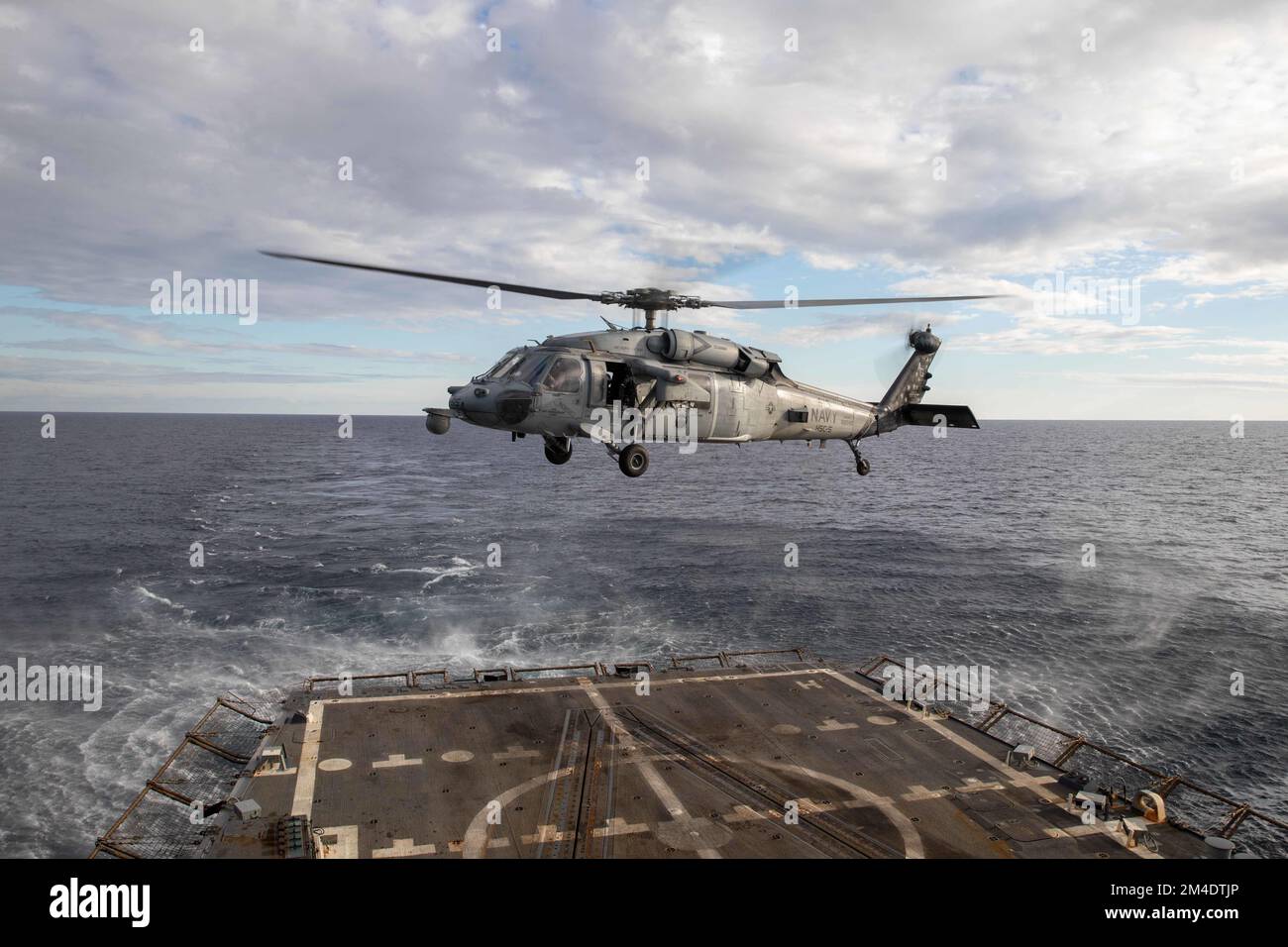 221218-N-EH998-1231 ADRIATIC SEA (Dec. 18, 2022) An MH-60S Nighthawk ...
