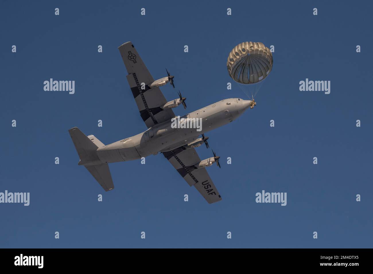 U.S. and foreign paratroopers jump off a C-130 Hercules from Ramstein ...
