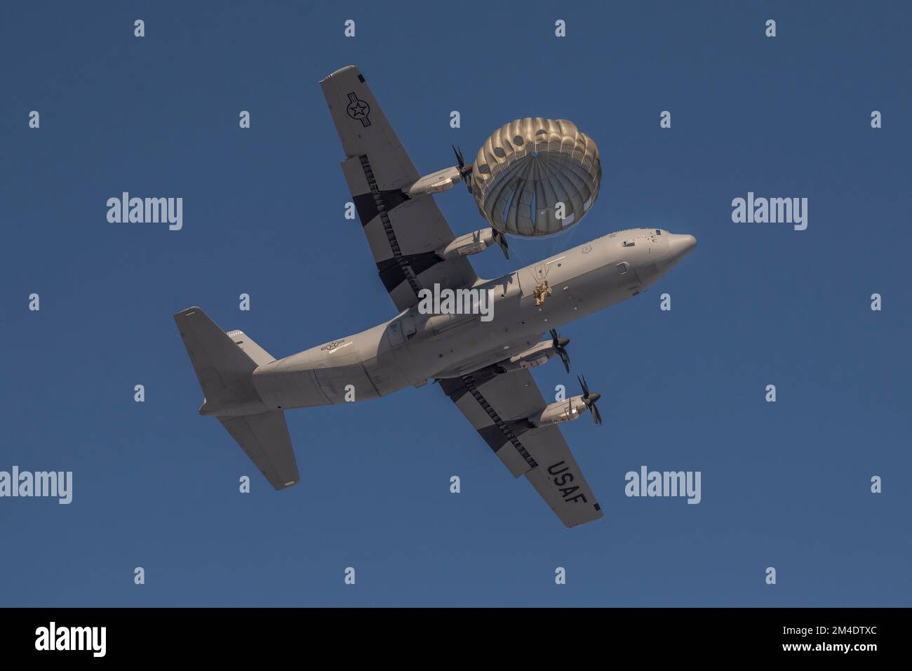 U.S. and foreign paratroopers jump off a C-130 Hercules from Ramstein ...
