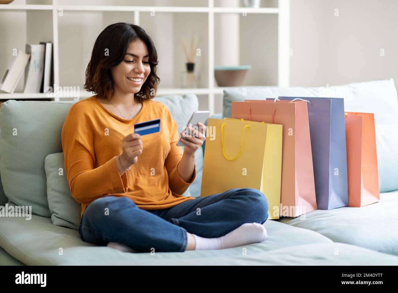 Female using smartphone online shopping hi-res stock photography and ...