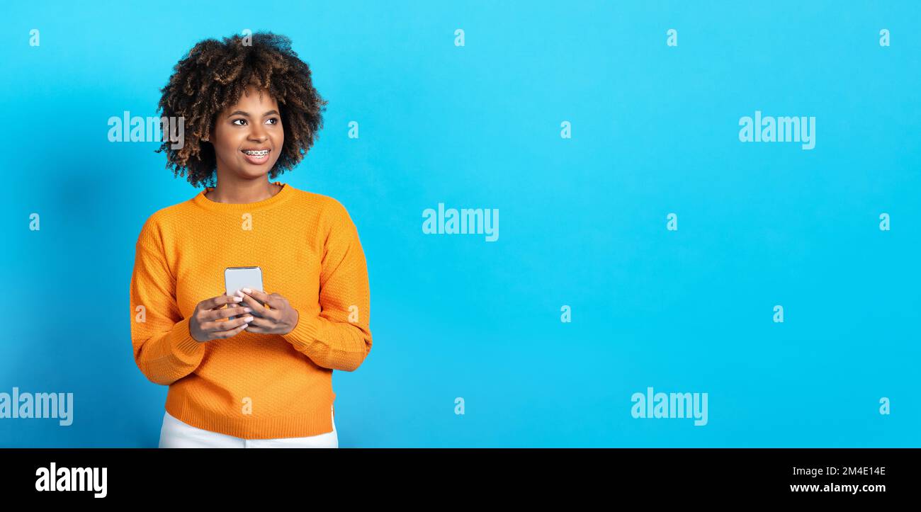 Happy young woman braces using hi-res stock photography and images - Alamy