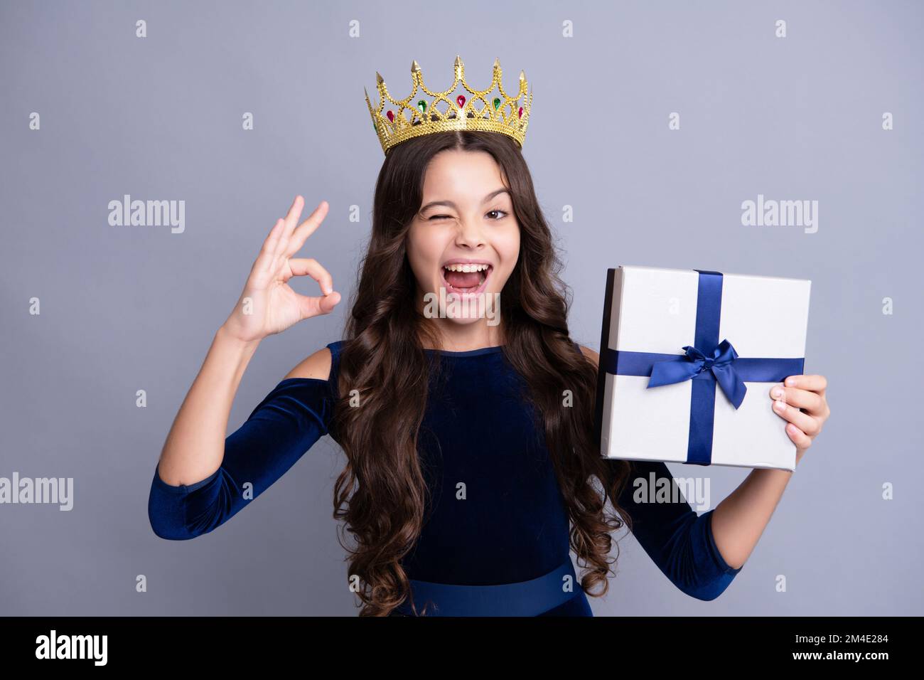 Excited teenager girl. Cute teenager child girl princess in crown ...