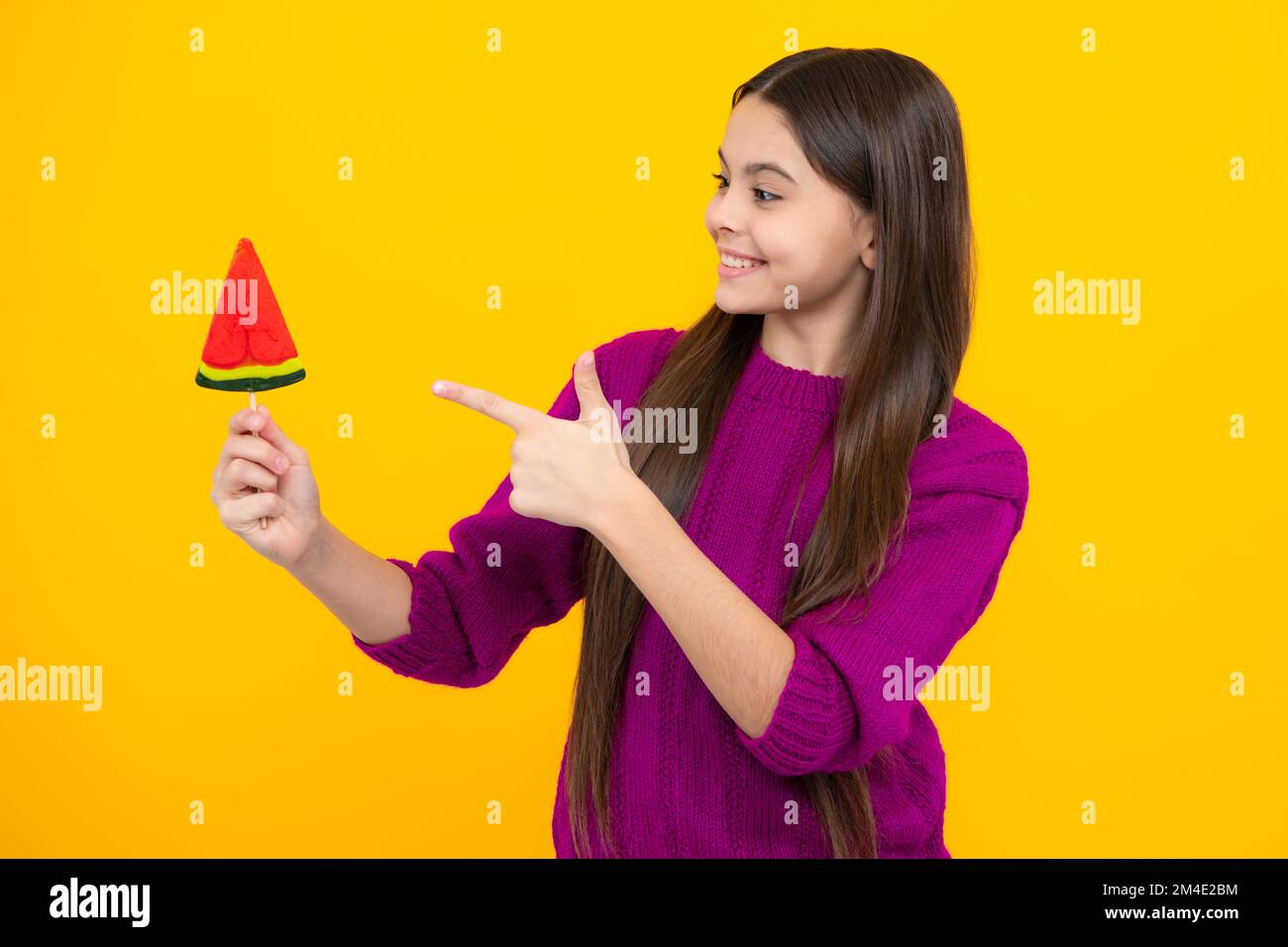 Teenage girl with candy lollipop, happy child 12, 13, 14 years old ...
