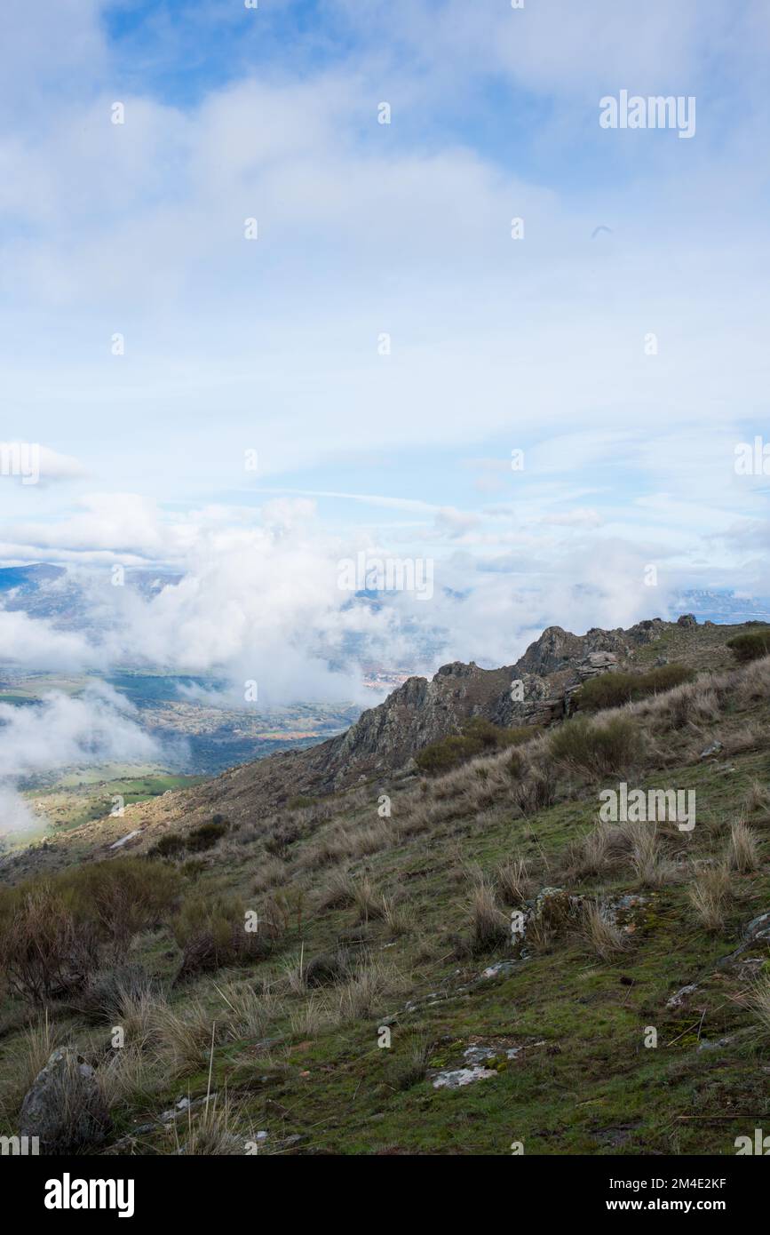 Beautiful landscape from a hill top. Low clouds over the valley. Madrid ...