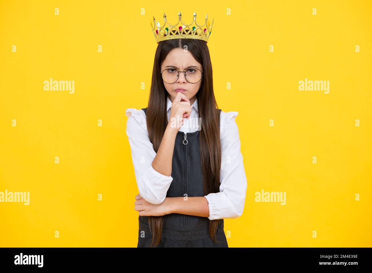 Beauty teen girl queen wear crown. Child in princess diadem. Thinking ...