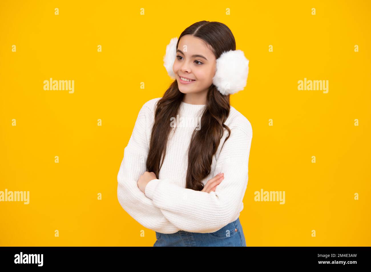 Modern teen girl wearing sweater and winter warm earmuff ear-flaps on ...