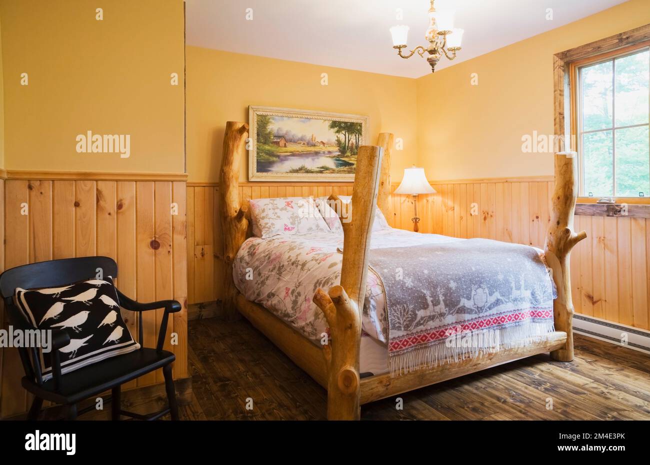 Rustic four poster bed in upstairs guest bedroom with nuanced brown ...