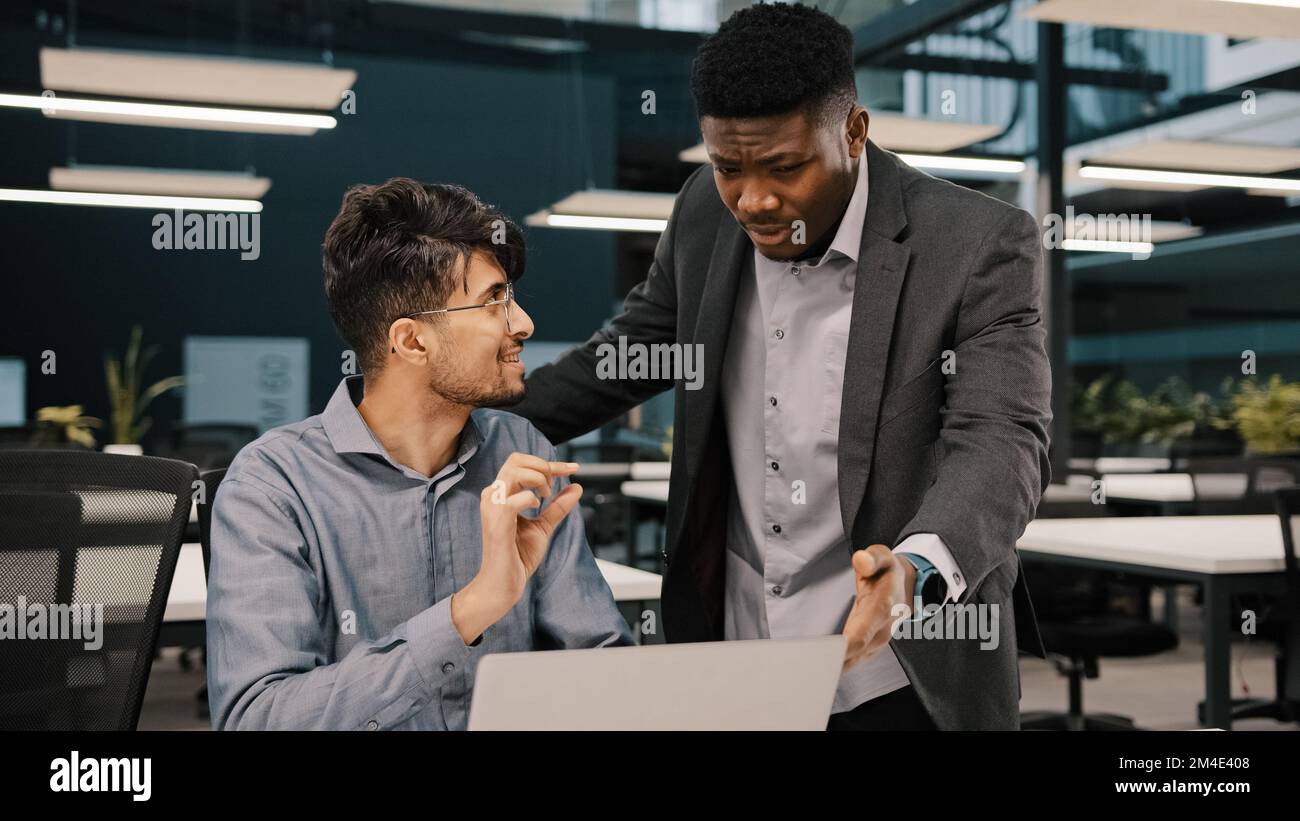 African man financial advisor male mentor boss angry businessman visit ...