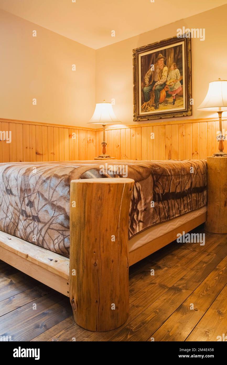 Rustic four poster bed in small upstairs guest bedroom with nuanced ...