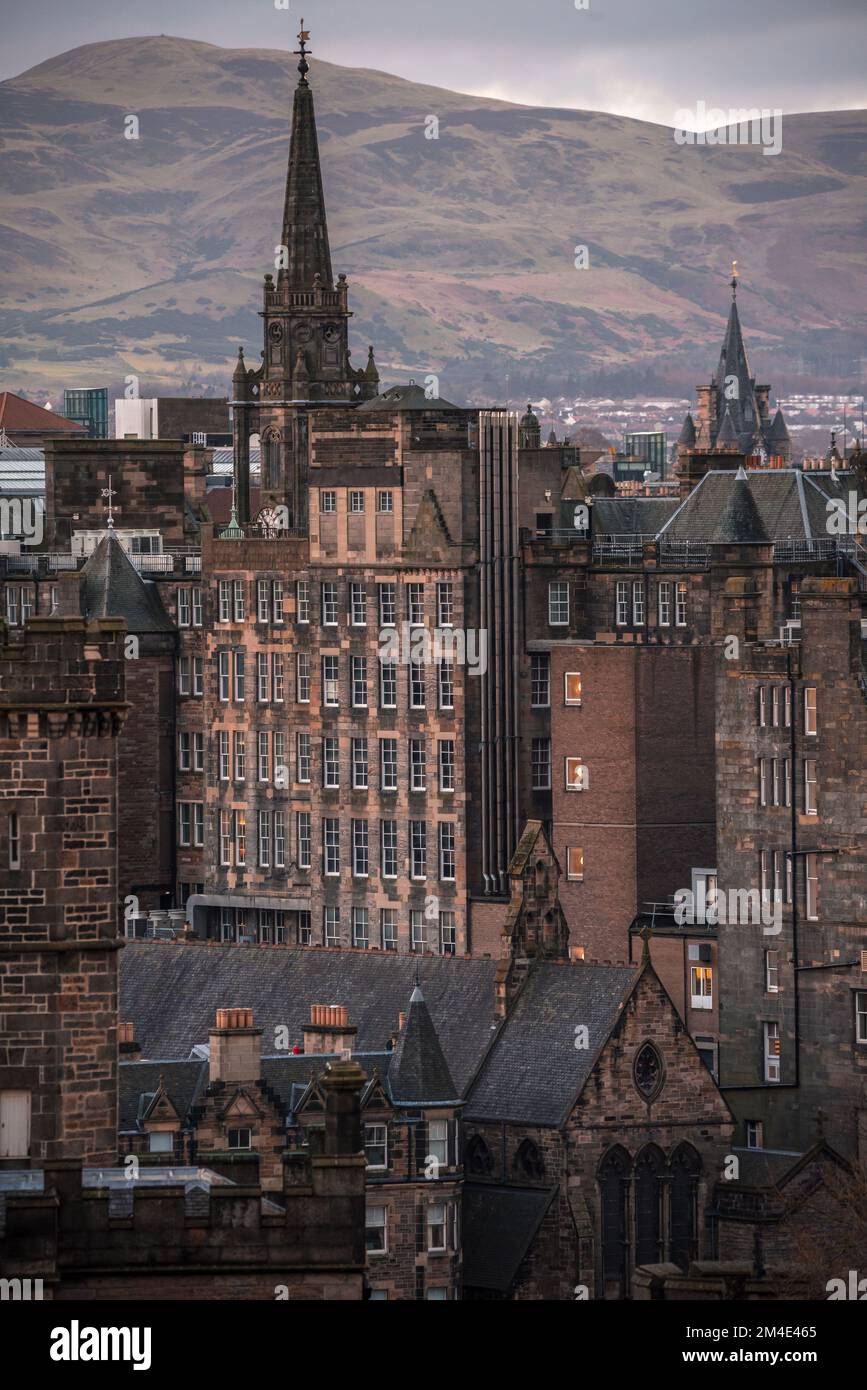 A vertical shot of old gothic buildings in downtown Edinburgh, Scotland ...
