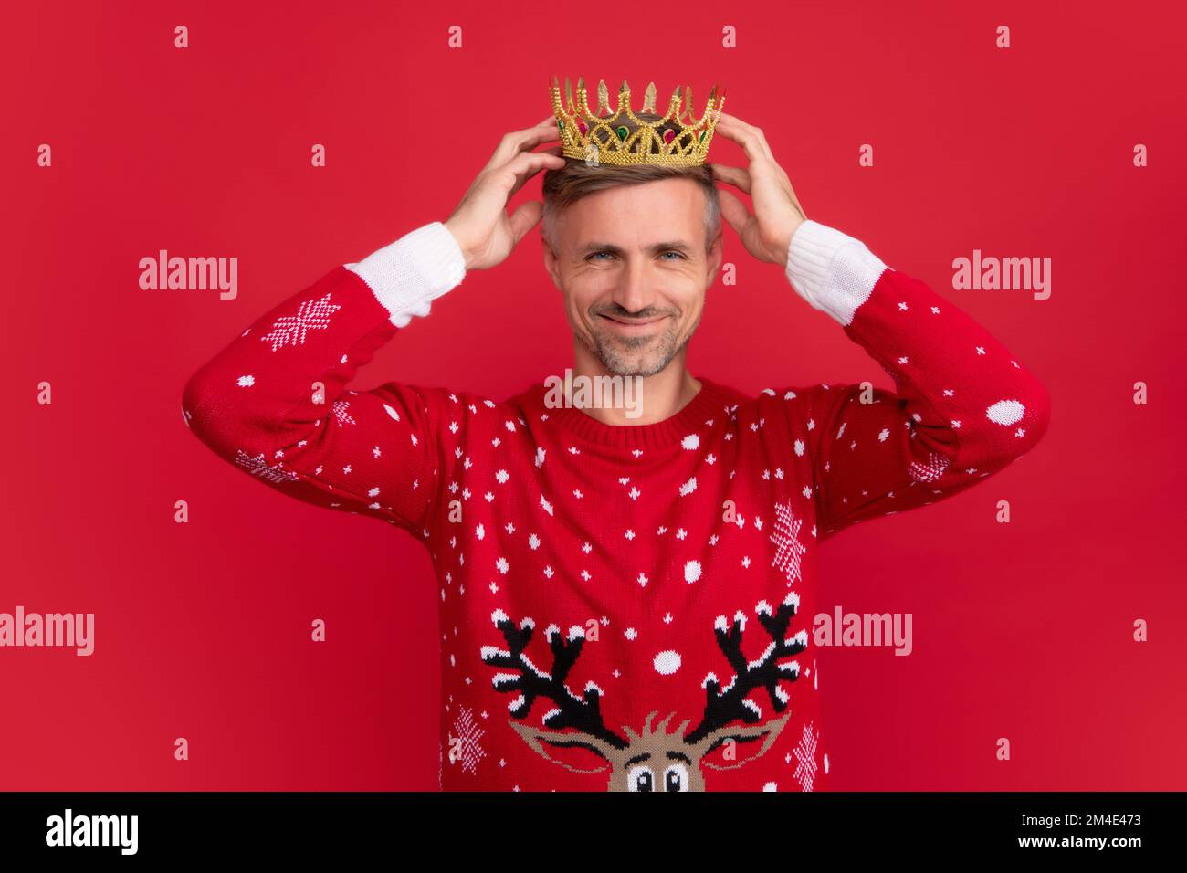 Winter man in crown. Middle aged santa. Man in Christmas winter sweater ...